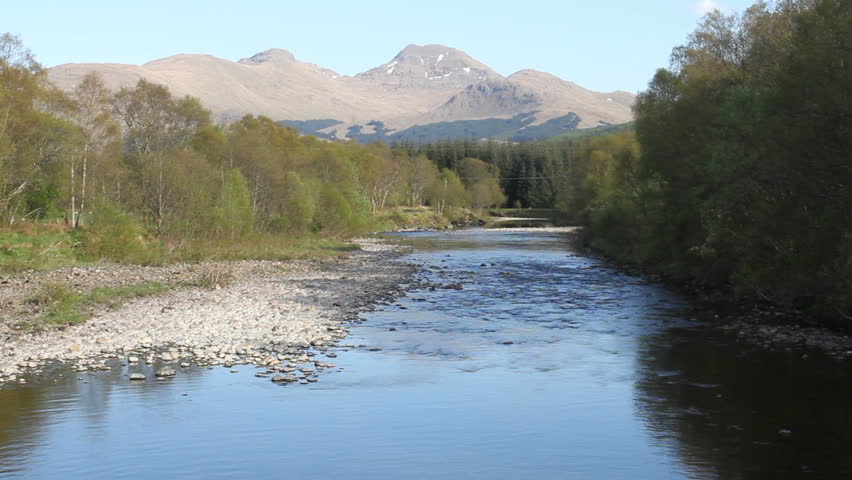 Stockvideoklipp på River Fillan with Cruach Ardrain (helt royaltyfria ...