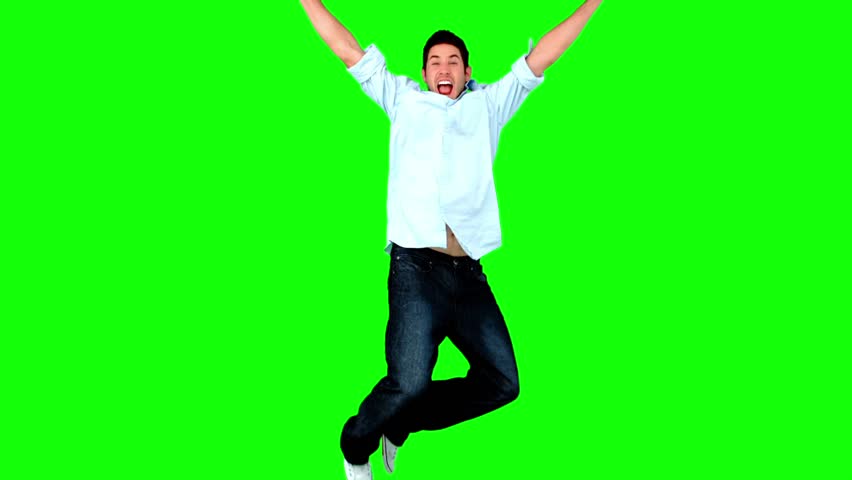 Stock video of young man jumping on green screen | 4049944 | Shutterstock