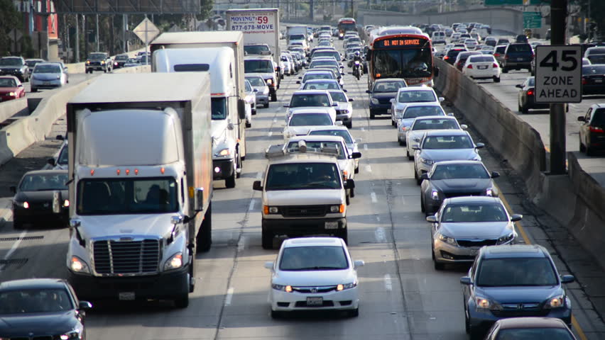 Cars Driving In Traffic Jam On 405 Freeway In Los Angeles, California ...