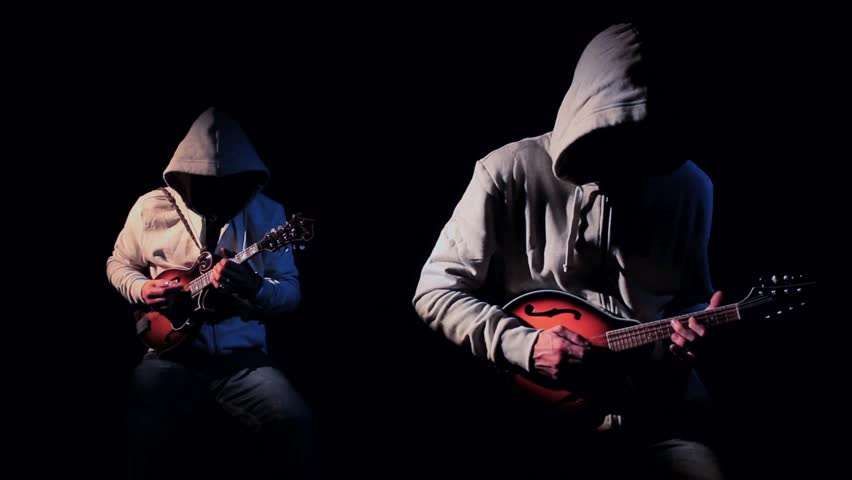 Stock video of 2 mysterious hooded musicians playing mandolin | 4476014 ...