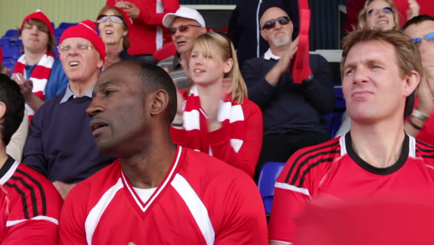 Enthusiastic Crowd Of Spectators Watching A Sports Game Or Football ...