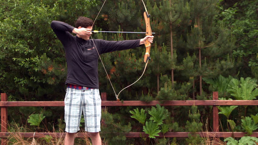 Athletic Man Shooting a Bow Stock Footage Video (100% Royalty-free ...