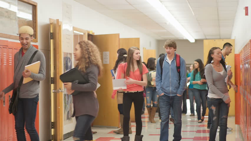 Time Lapse Of Busy Students And Teachers Walking Through The Hallway Of ...