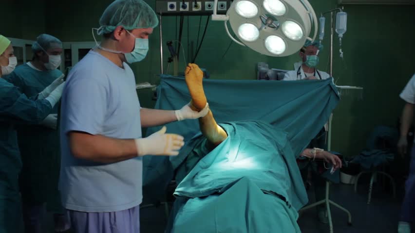 Stock video of surgeons team performing operation in hospital | 5588564 ...