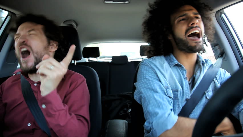 Stock video of two men in car having fun | 6089354 | Shutterstock