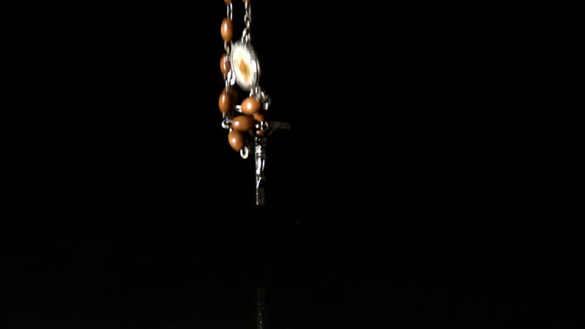 Crucifix Falling On Black Background Stock Footage Video (100% Royalty ...