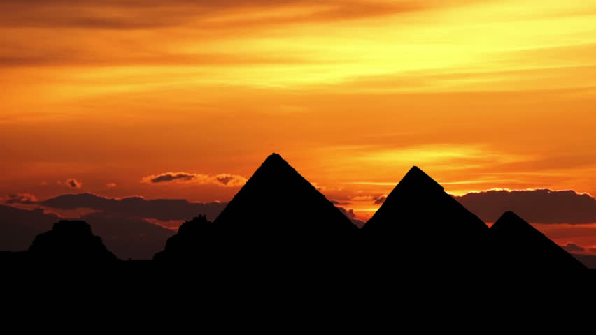 Stock video of sunrise behind great pyramids in giza | 6748294 ...