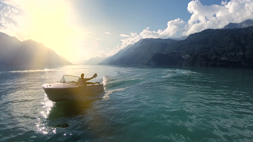 Stock Video Clip of aerial view of motor boat ride on | Shutterstock