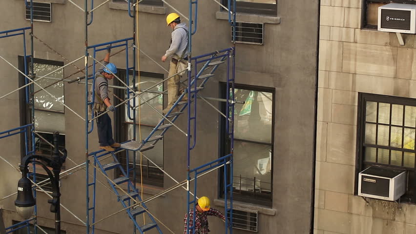 NEW YORK - SEPT 15, 2014: Construction Laborer Taking Break, Doing Pull ...