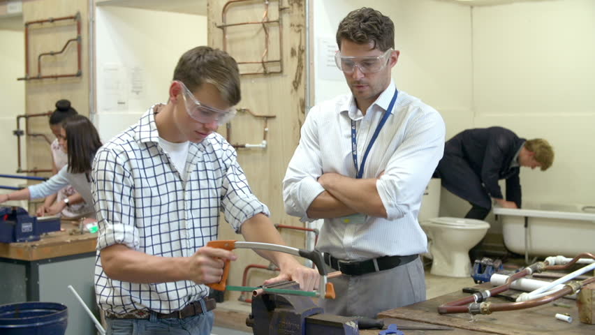 Students Studying To Become Plumbers Listening To Teacher. Shot On Sony ...