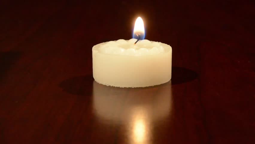 A Single Tea Light Candle Stock Footage Video (100% Royalty-free ...