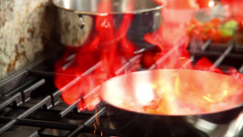 Chef Cooking With Fire In A Pan On A Stove Stock Footage Video 9575402 ...